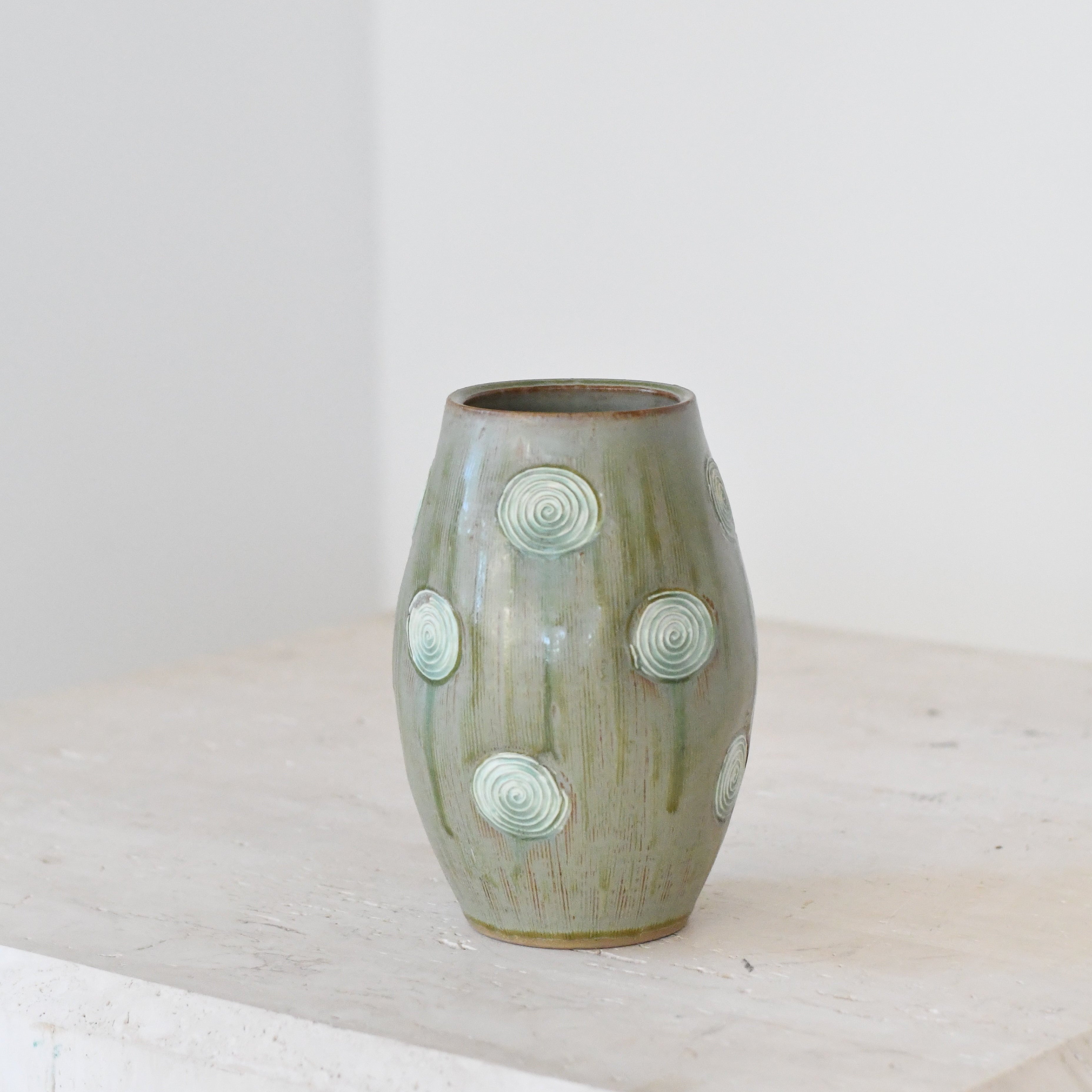 Glazed Green Pottery With Swirl Accents | Process Home